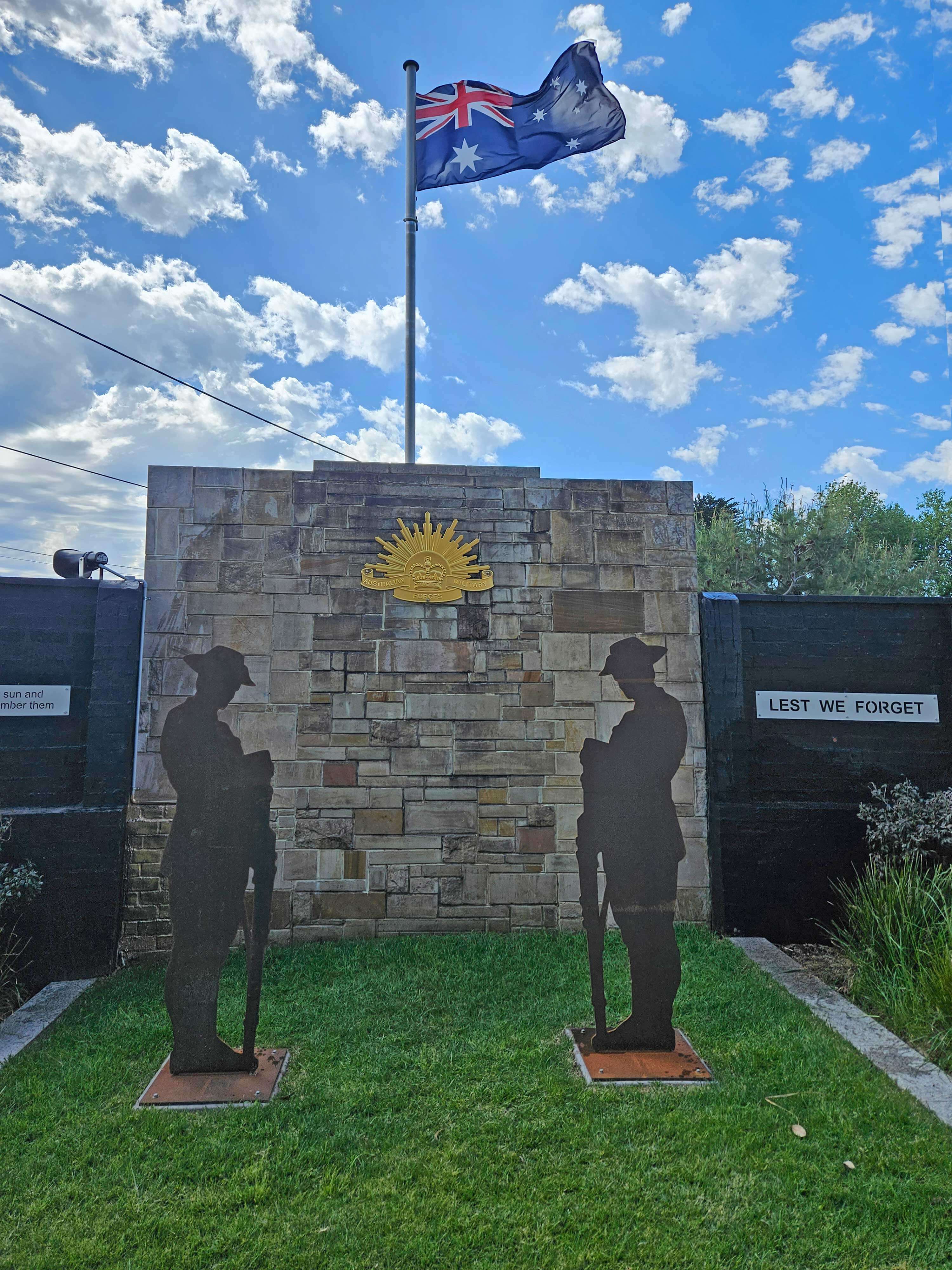 Rising Sun at the Cenotaph of RSL Doncaster Sub-Branch Is Up